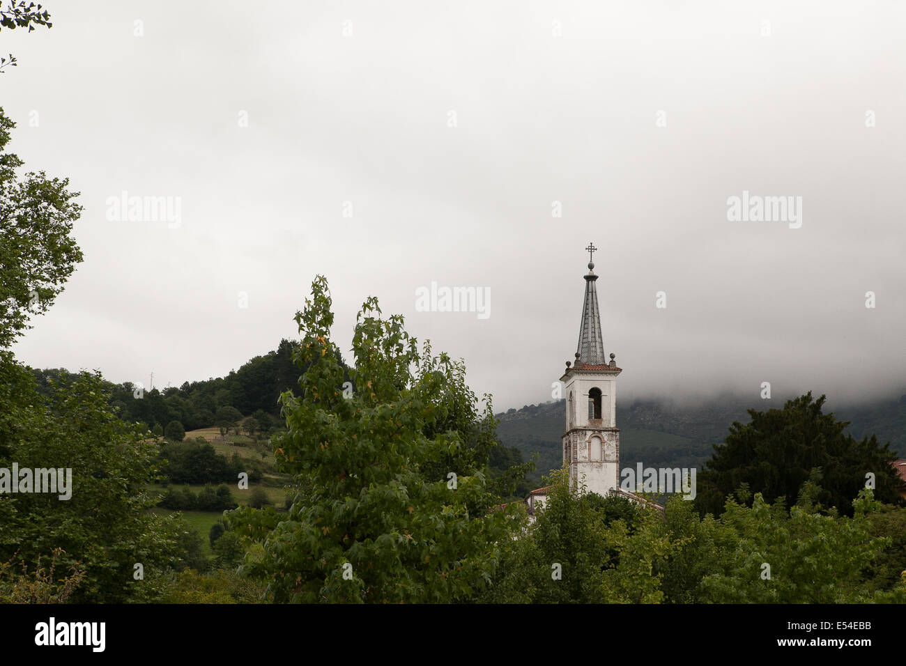 Bell tower over trees Stock Photo - Alamy