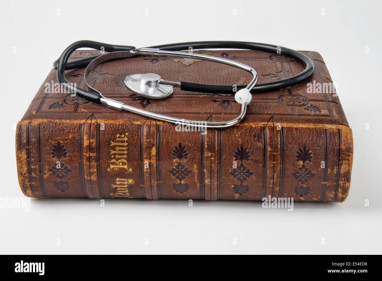 Christian bible with a medical stethoscope placed on top Stock Photo ...