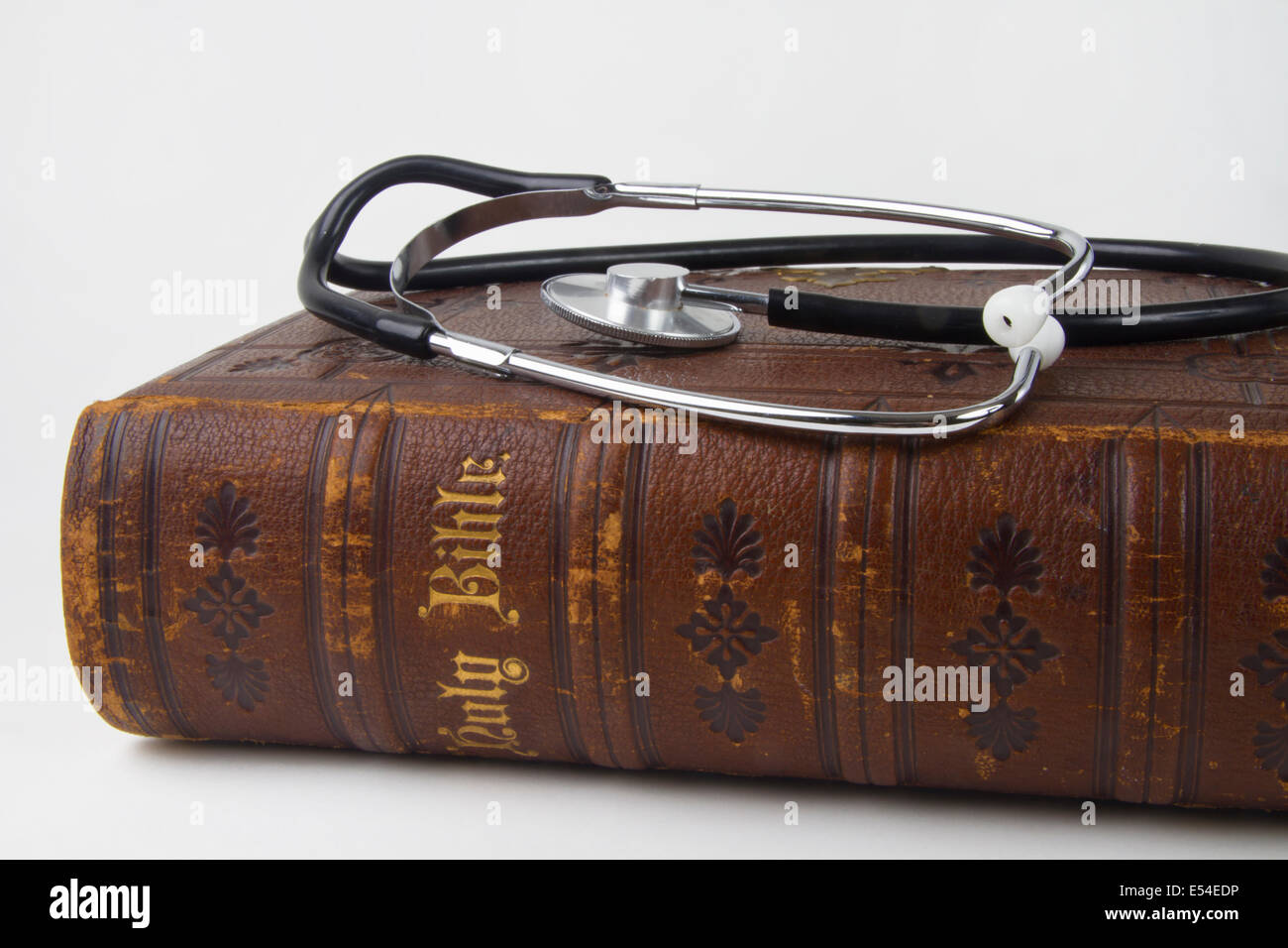 Christian bible with a medical stethoscope placed on top Stock Photo ...