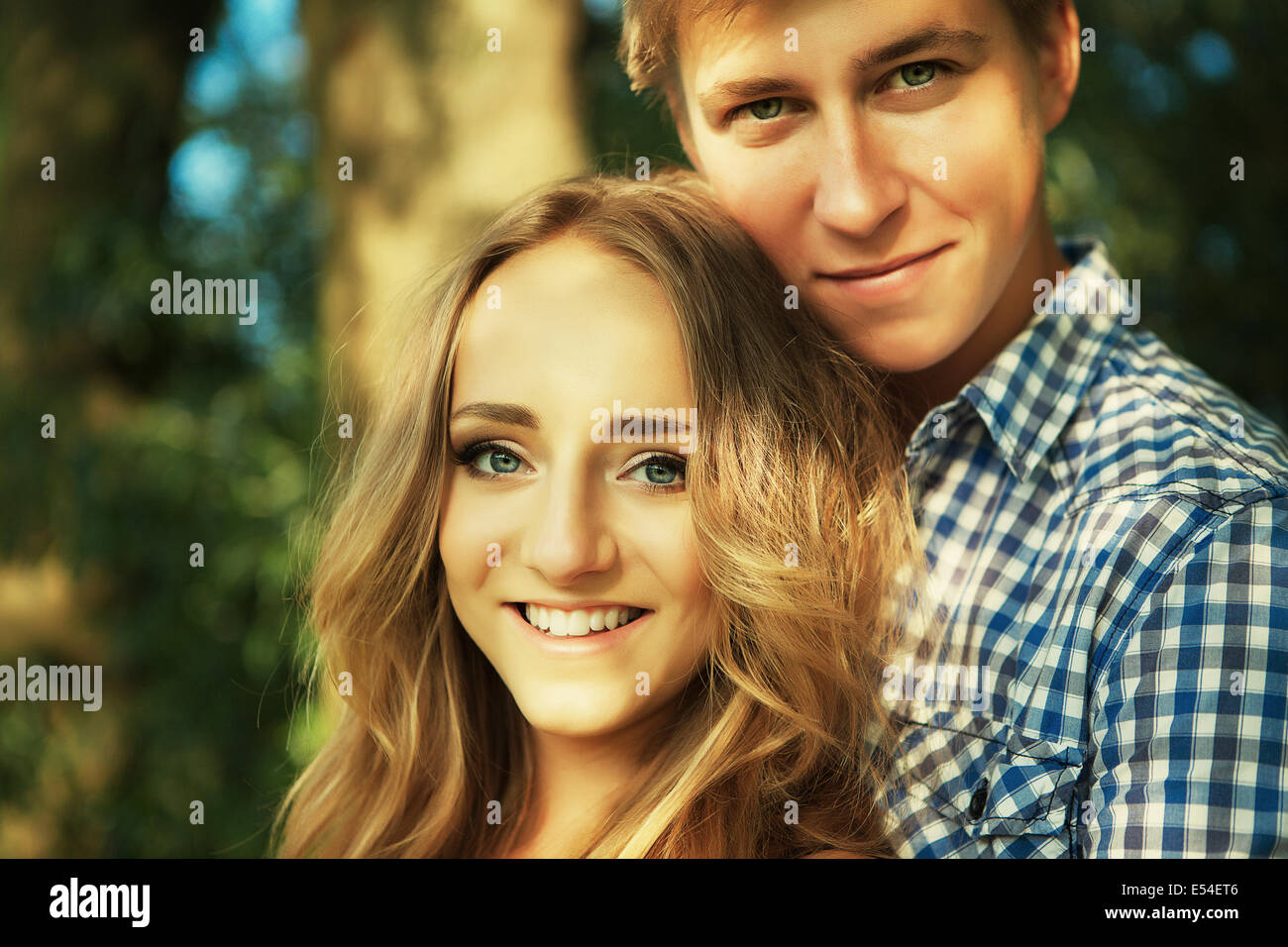 Young couple in nature on summer, they looking into the camera Stock ...