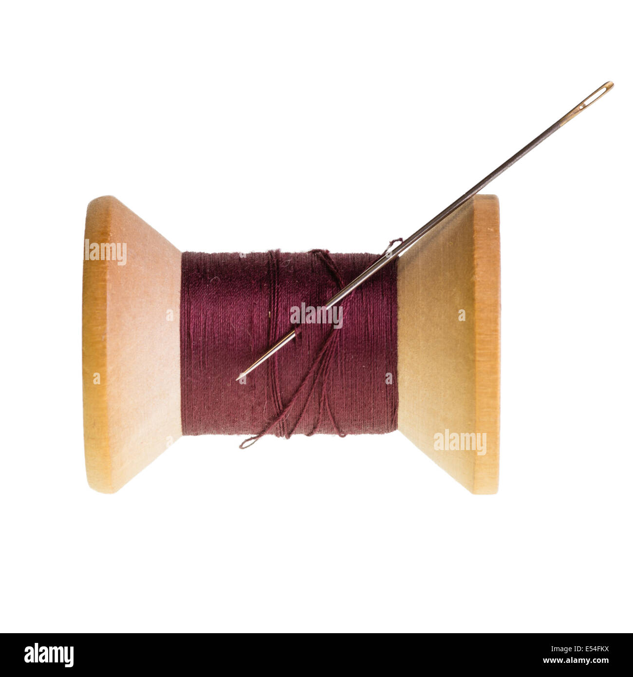 Spool of red sewing thread isolated on white Stock Photo - Alamy