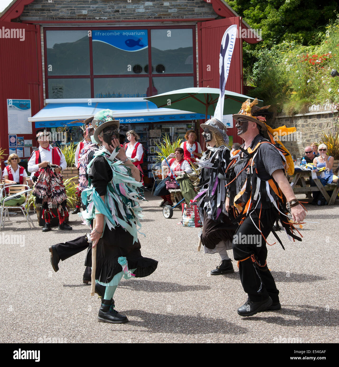 Morris dancers with blackened faces dancing on the Pier at Ilfracombe ...