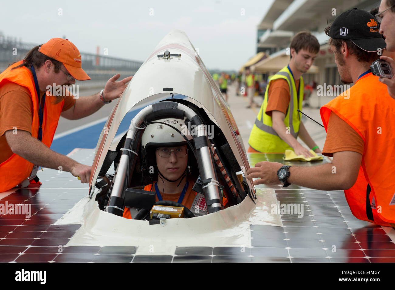 University of Texas team members ready their solar car for qualifying ...
