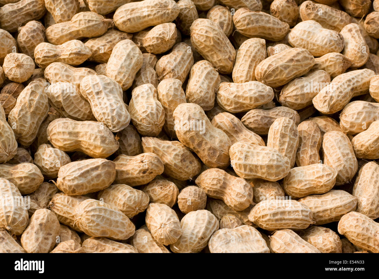 Pile of Peanut background Stock Photo - Alamy