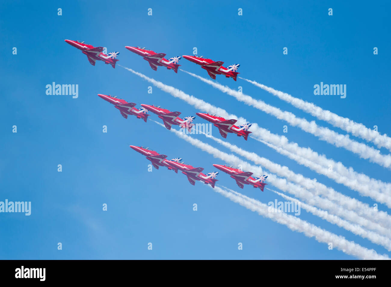 The Red Arrows Hawk jets aerobatic display with white smoke at the ...