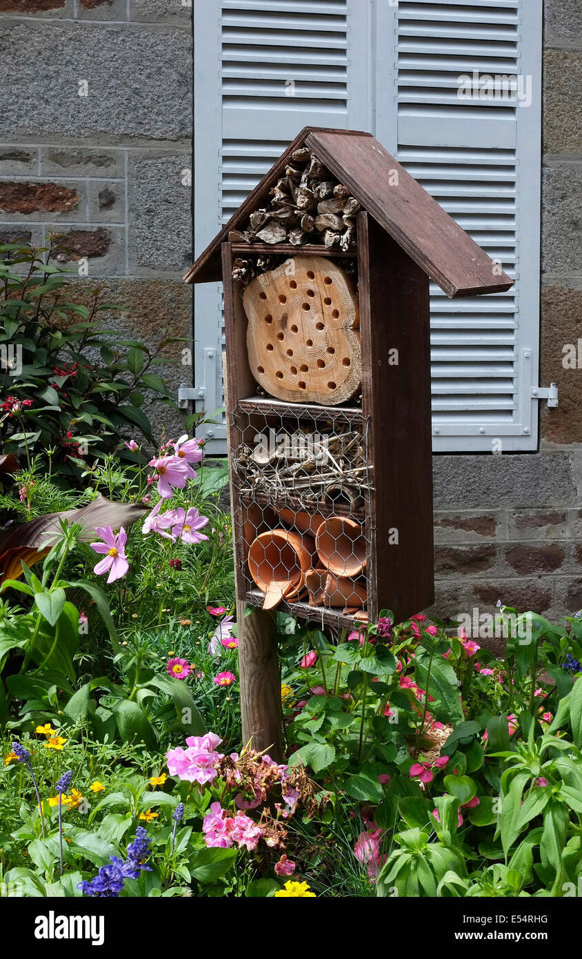 handmade insect bug hotel in garden Stock Photo - Alamy