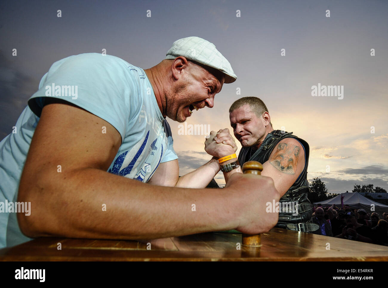 Narva, Estonia. 20th July, 2014. Bikers compete in hand wrestling ...