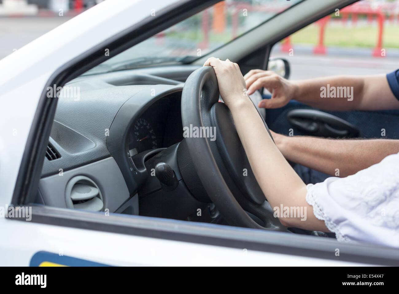 close up of woman's hand driving a car Stock Photo - Alamy