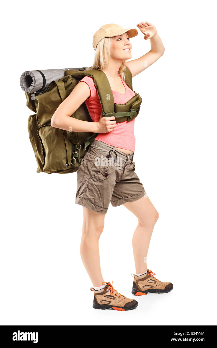 Full length portrait of a female hiker looking up Stock Photo - Alamy