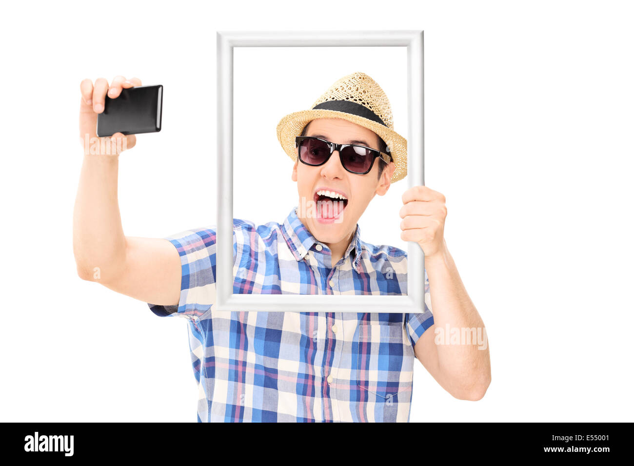 Man holding a picture frame and taking a selfie Stock Photo - Alamy