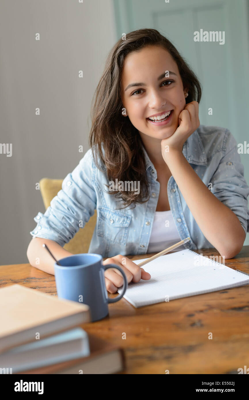 Smiling teenage student hi-res stock photography and images - Alamy