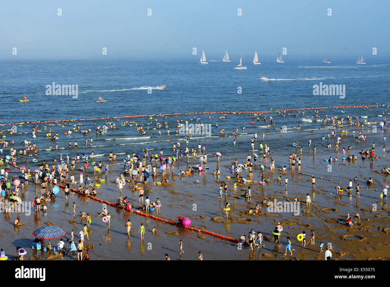 Rizhao, China. 20th July, 2014. JULY 20: A large number of tourists ...