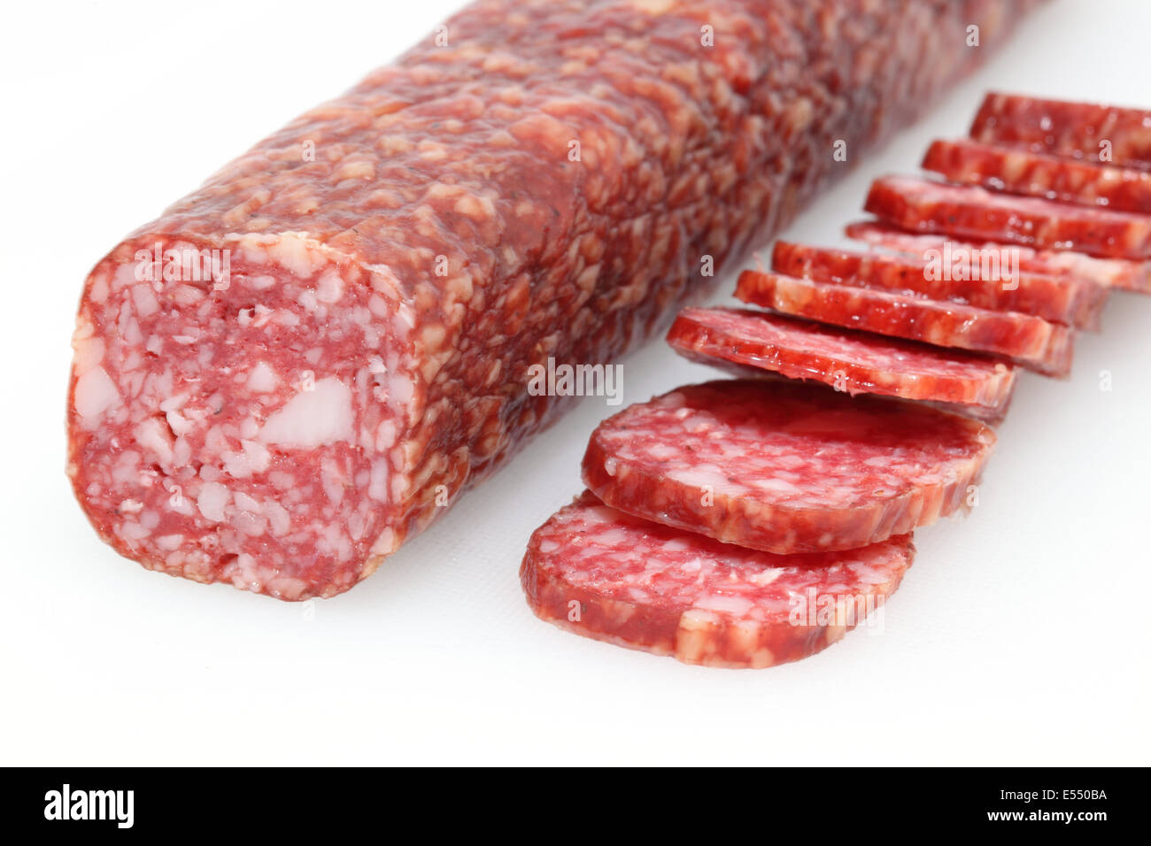 salami isolated on white background Stock Photo - Alamy