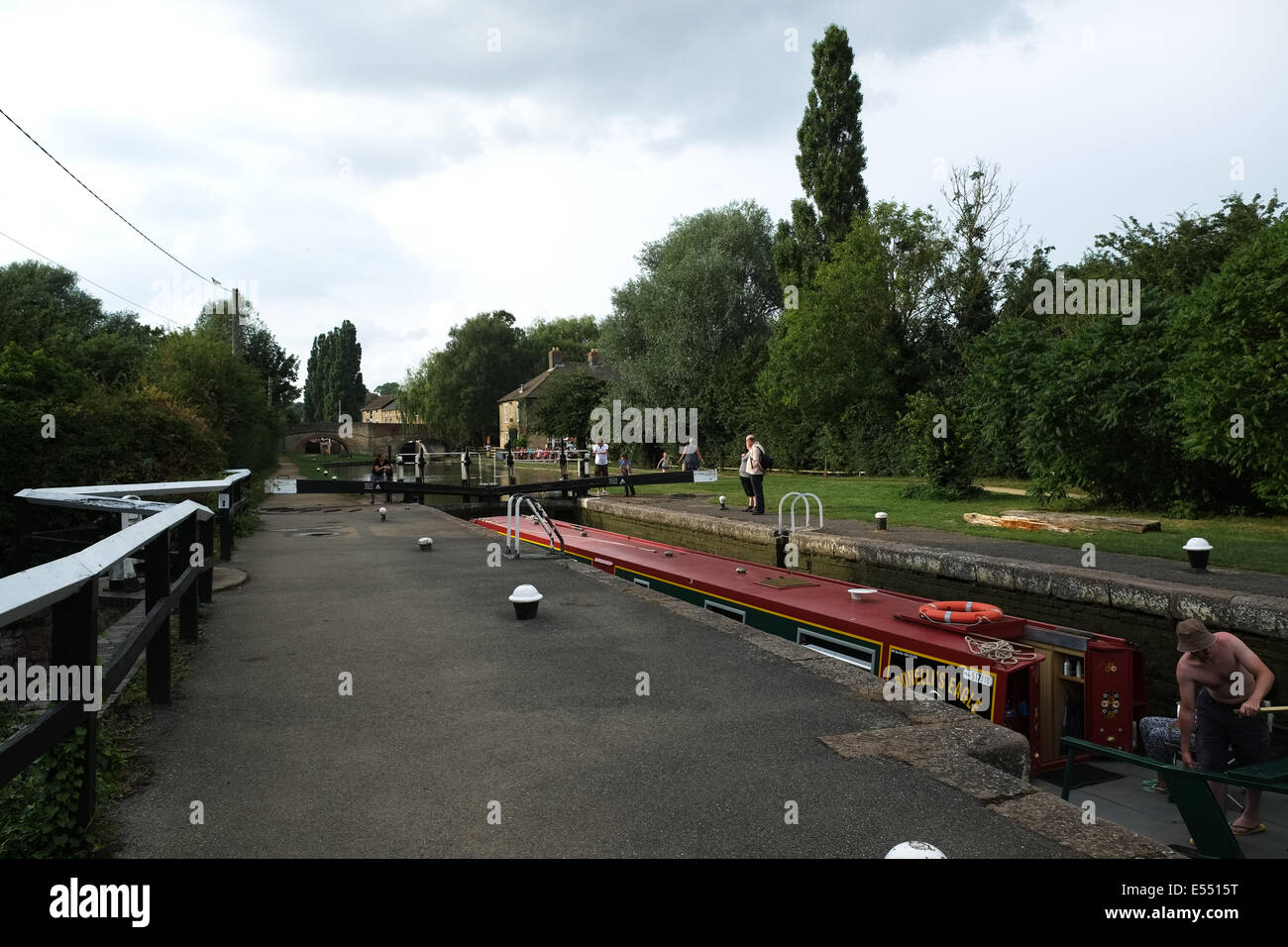 Barge being raised at a lock gate in Stoke Bruerne, Northamptonshire ...