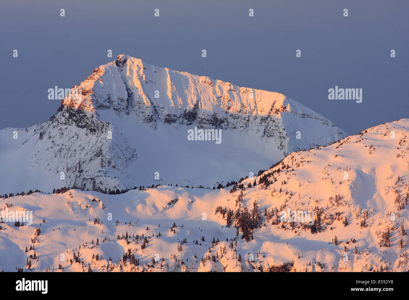 View of snow covered mountain peak at sunrise, Mount Regan, Vancouver ...
