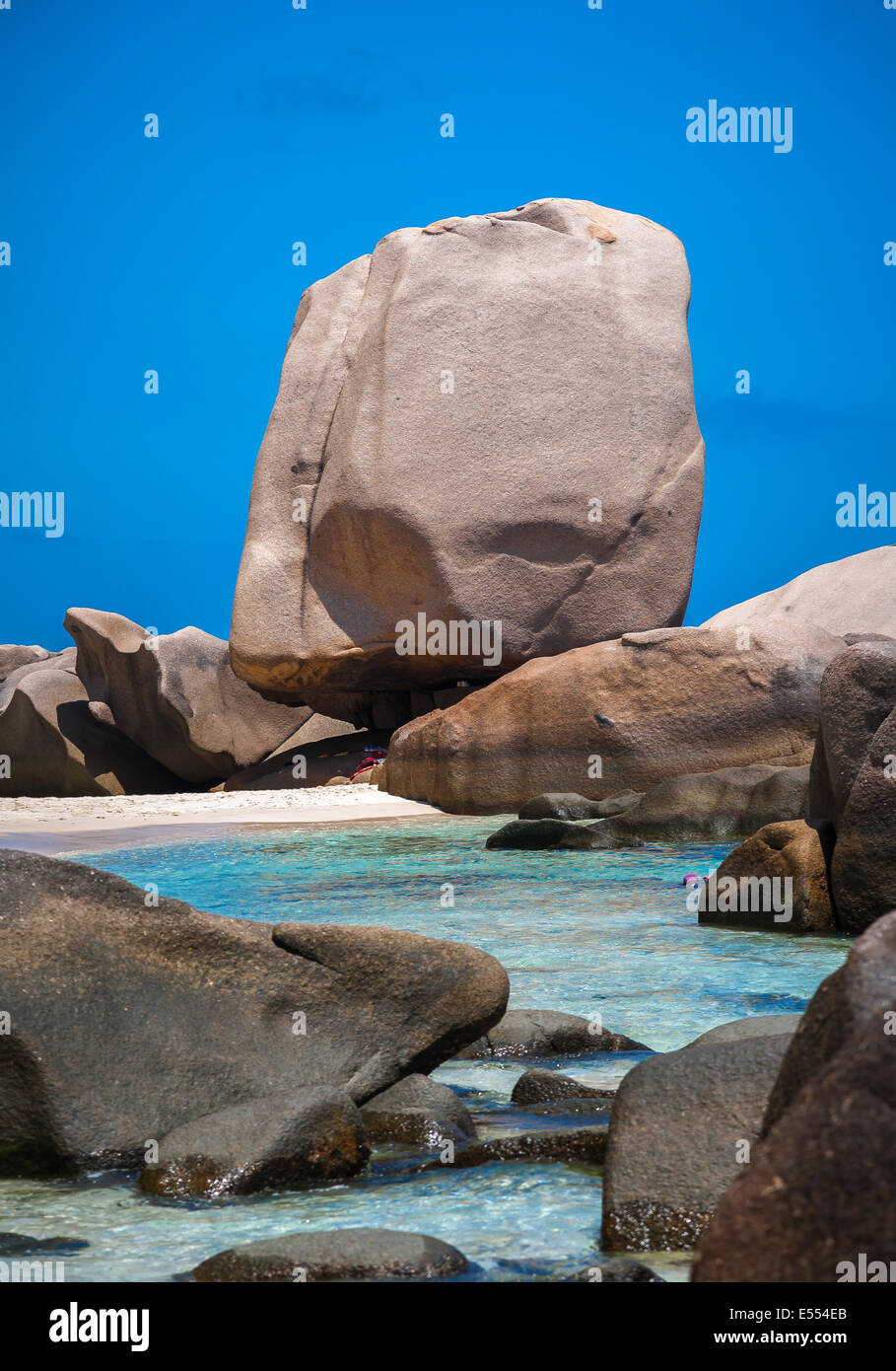 Unusual Standing Stone On A Tropical Beach Stock Photo - Alamy