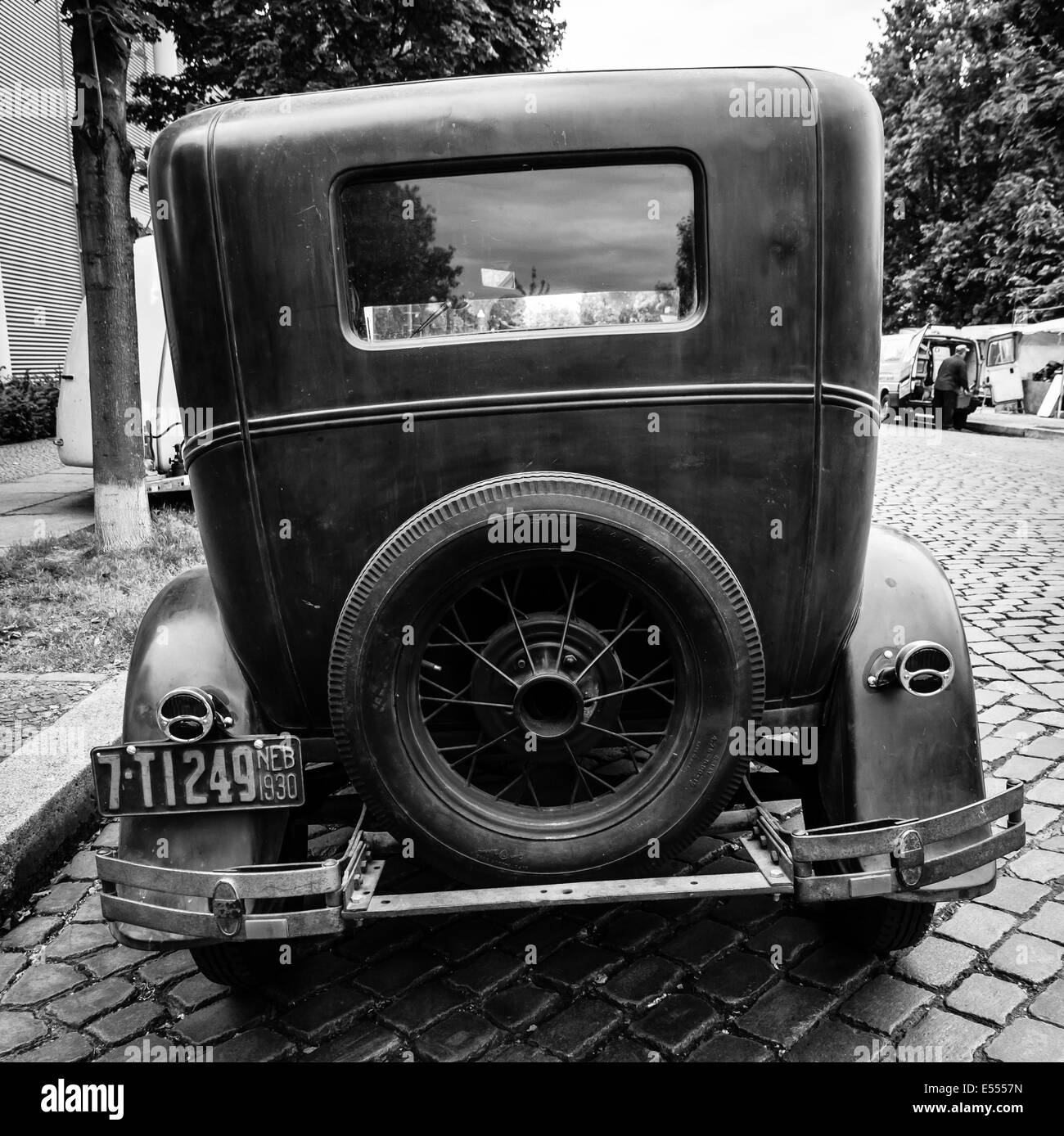 Oldtimer Ford Model A Deluxe Tudor Sedan (1930). Black and white. Rear ...