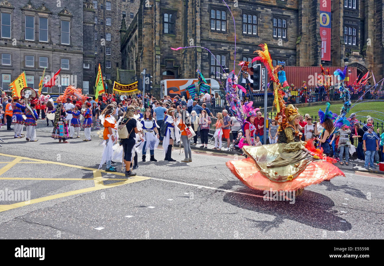 Participants in the Edinburgh Carnival on 20 July 2014 line up on the ...