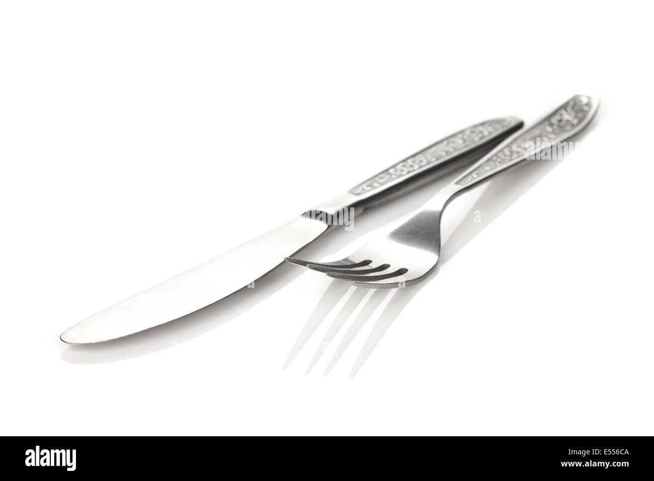 Silverware or flatware set of fork and knife. Isolated on white ...