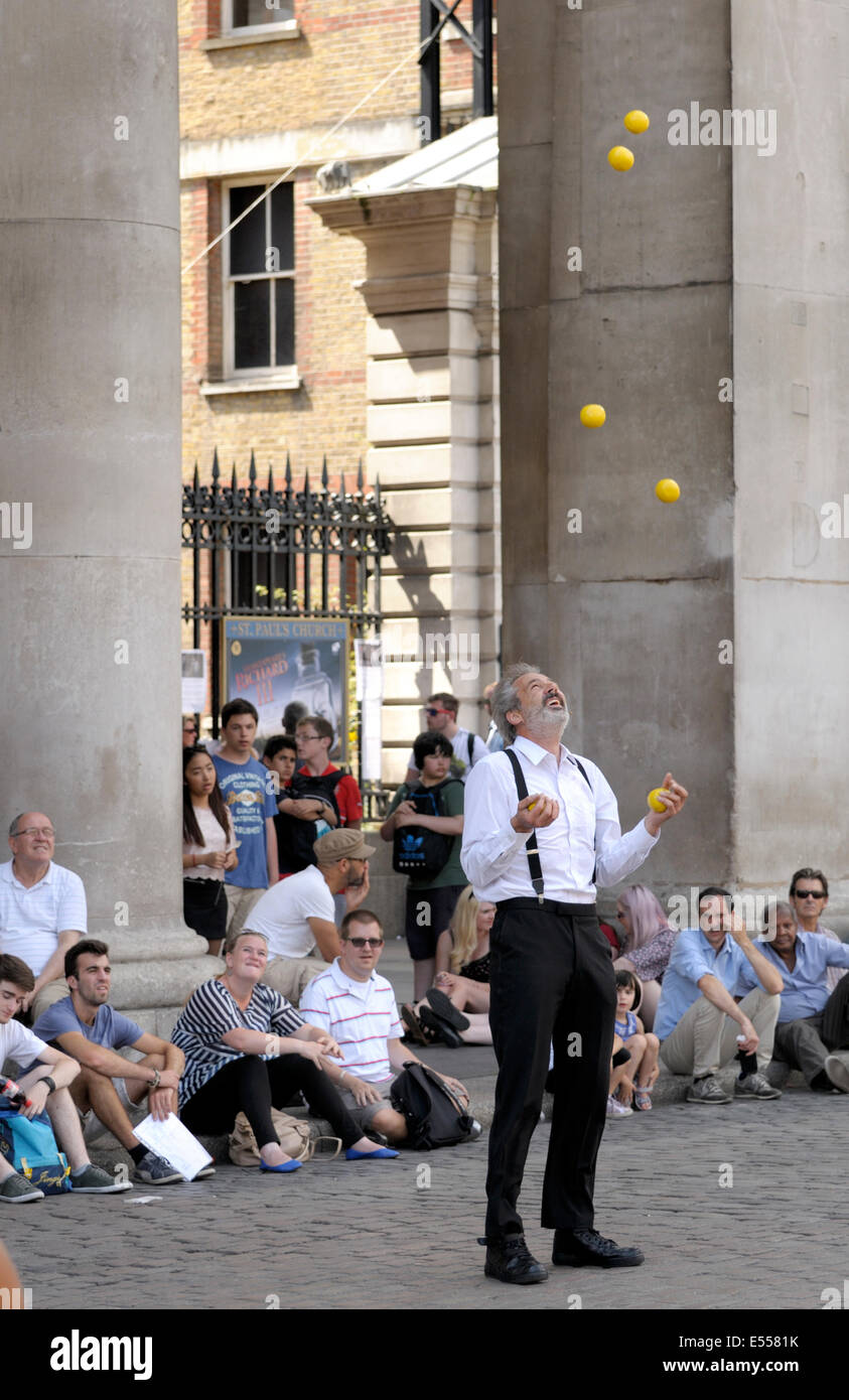 London, England, UK. Juggler busking in Covent Garden Stock Photo - Alamy