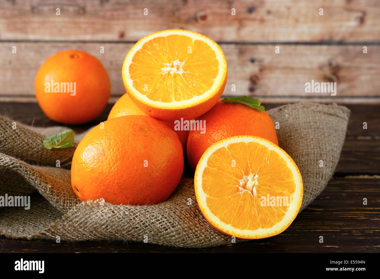 ripe orange cut in half, food closeup Stock Photo - Alamy
