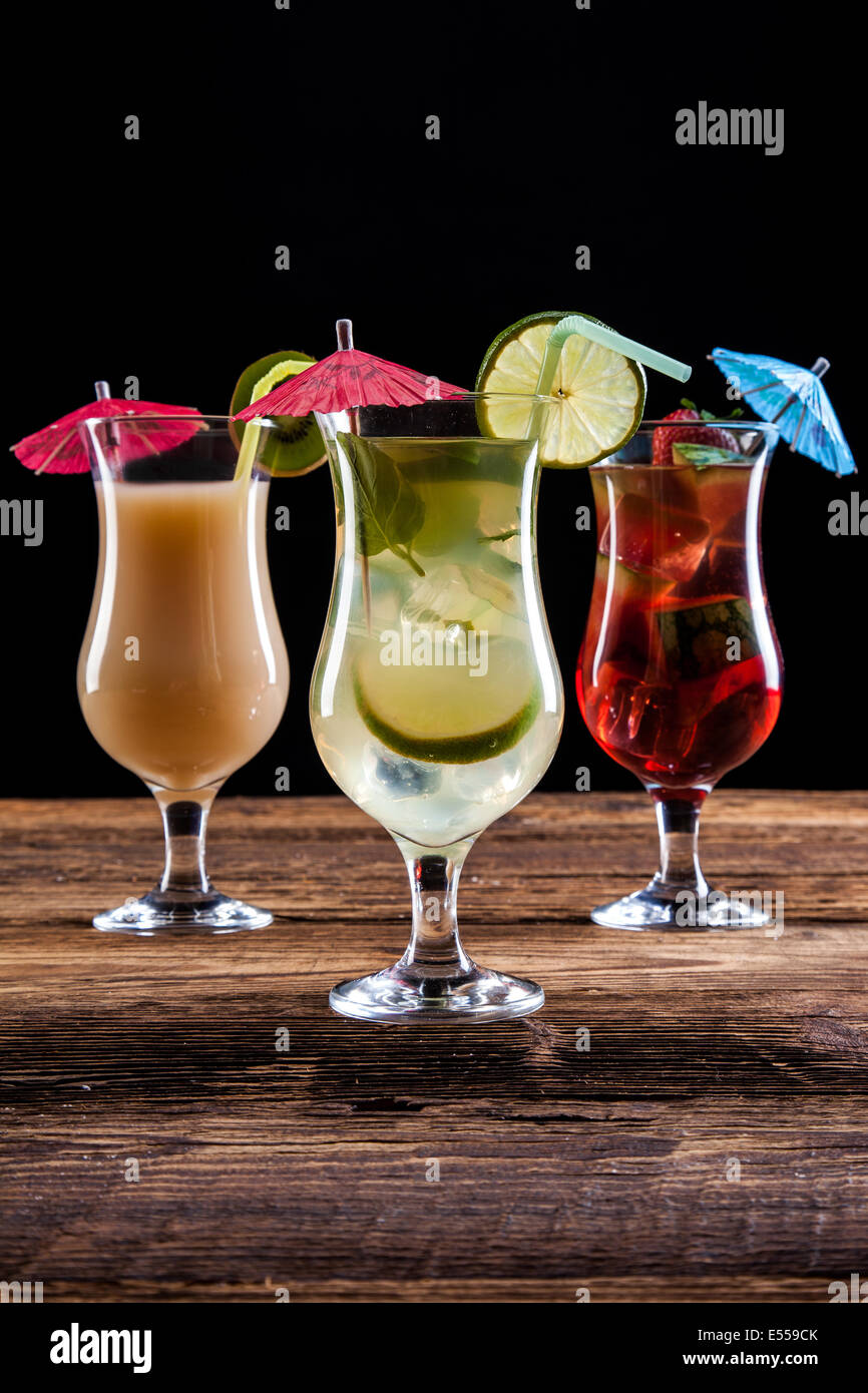 Exotic alcohol drinks set with fruits Stock Photo - Alamy