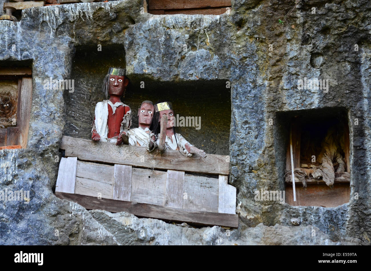 Tau Tau ancestral figures of the Toraja people in rock tomb, Rantepao ...