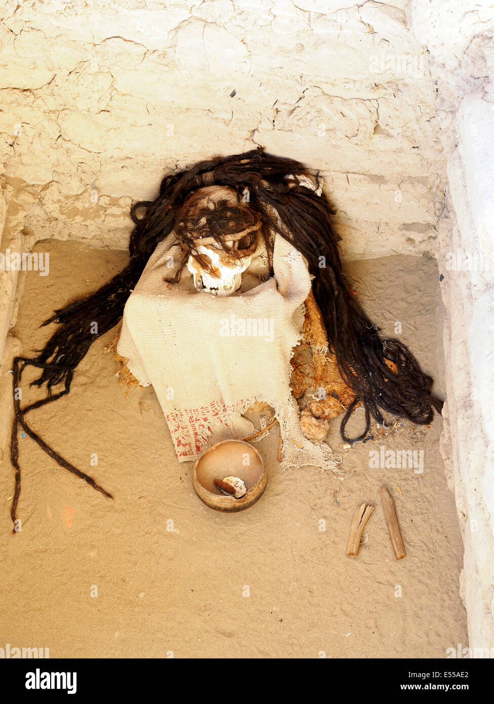 Prehispanic mummified human remains and archeological artifacts in the ...