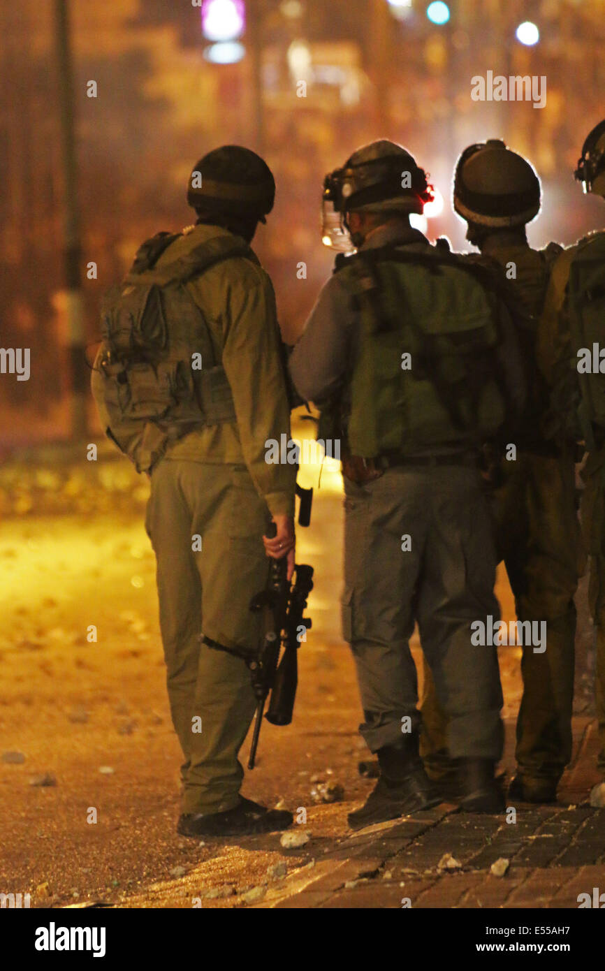 Gaza. 20th July, 2014. An Israeli sniper stands at ease, watching the ...