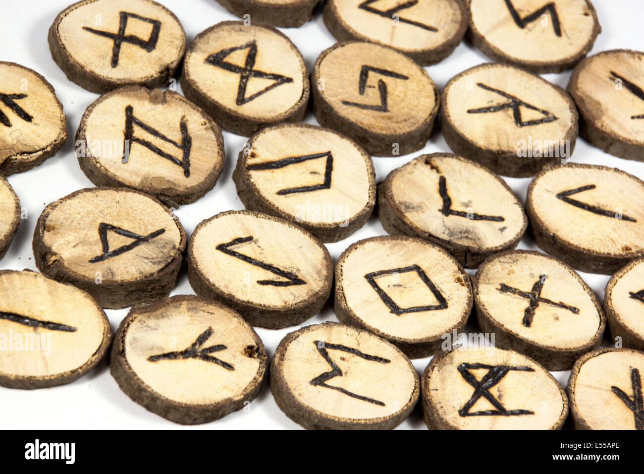 closeup symbols on collection of wooden runes Stock Photo - Alamy