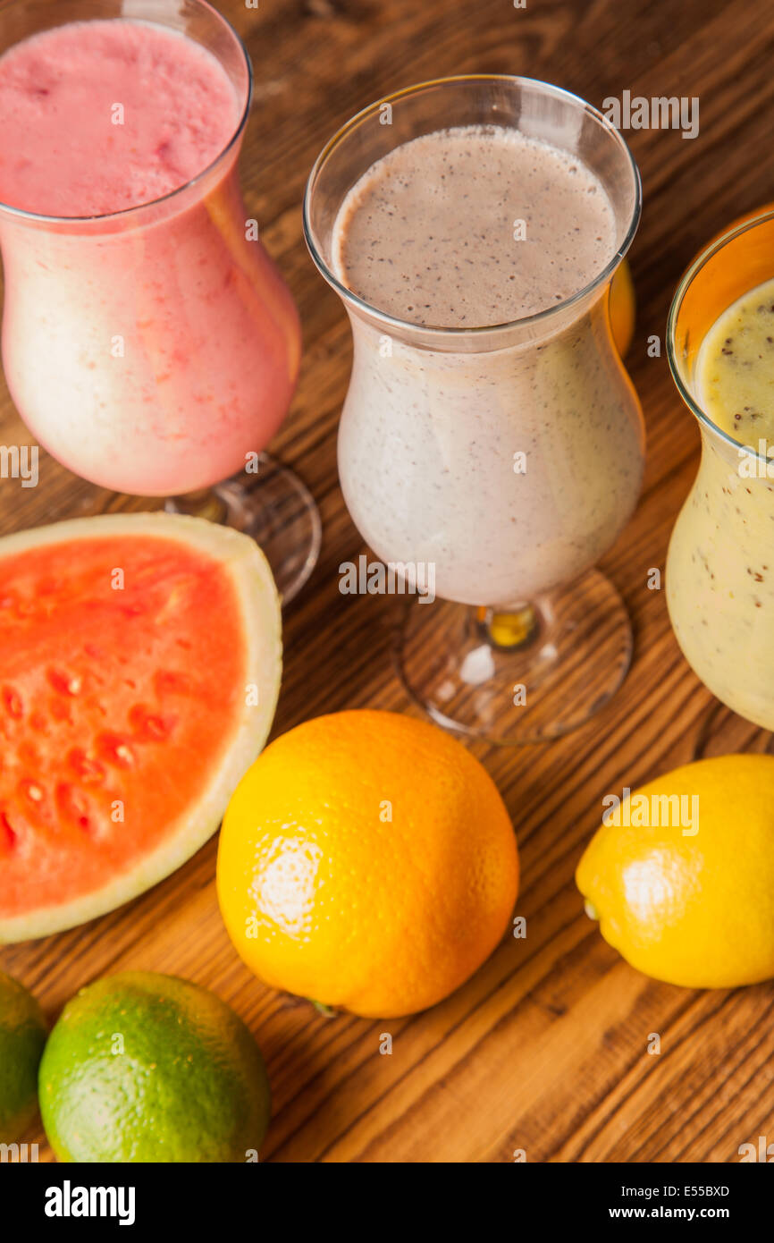 Exotic alcohol drinks set with fruits isolated on white background ...