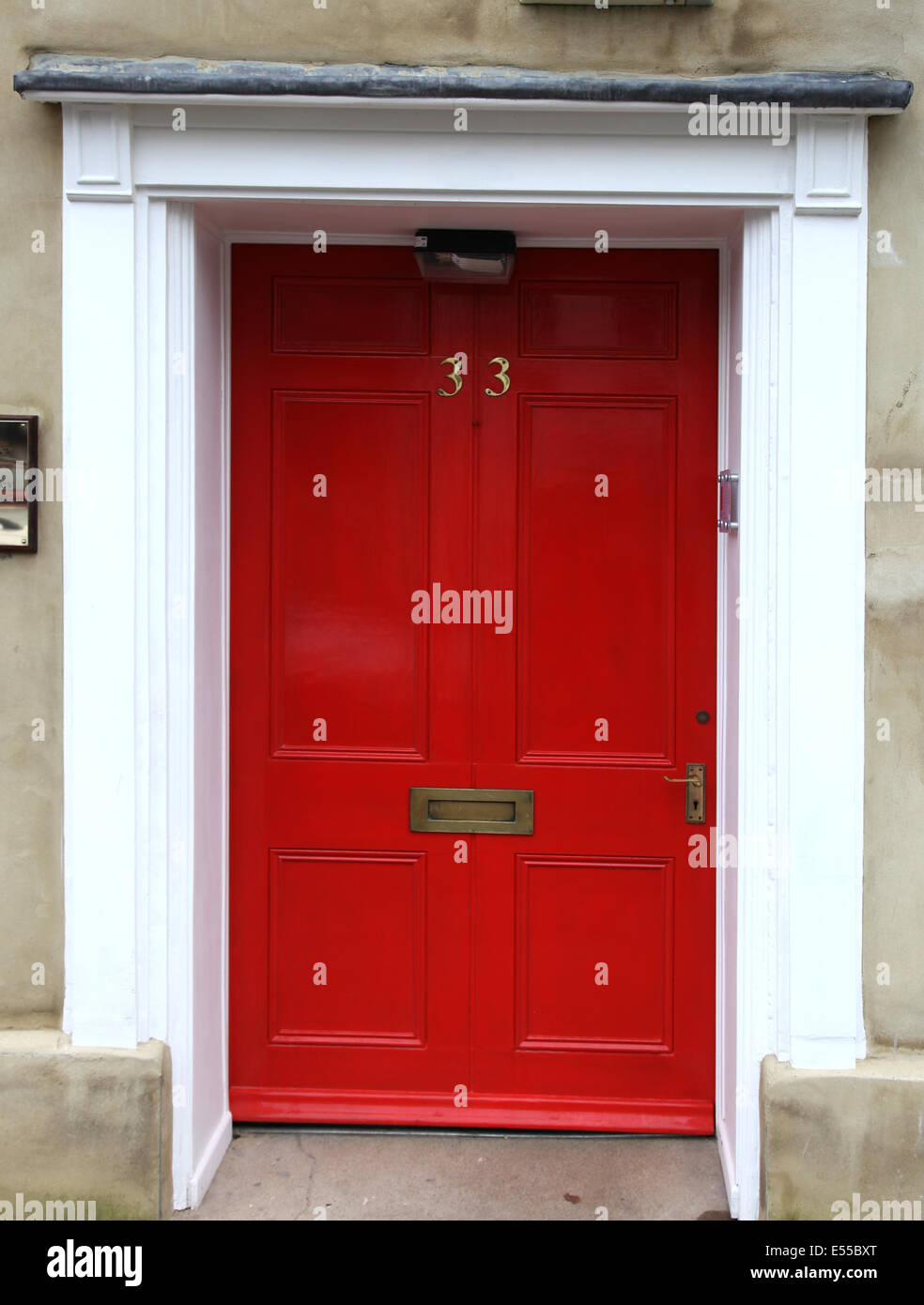 red door number 33 Stock Photo - Alamy