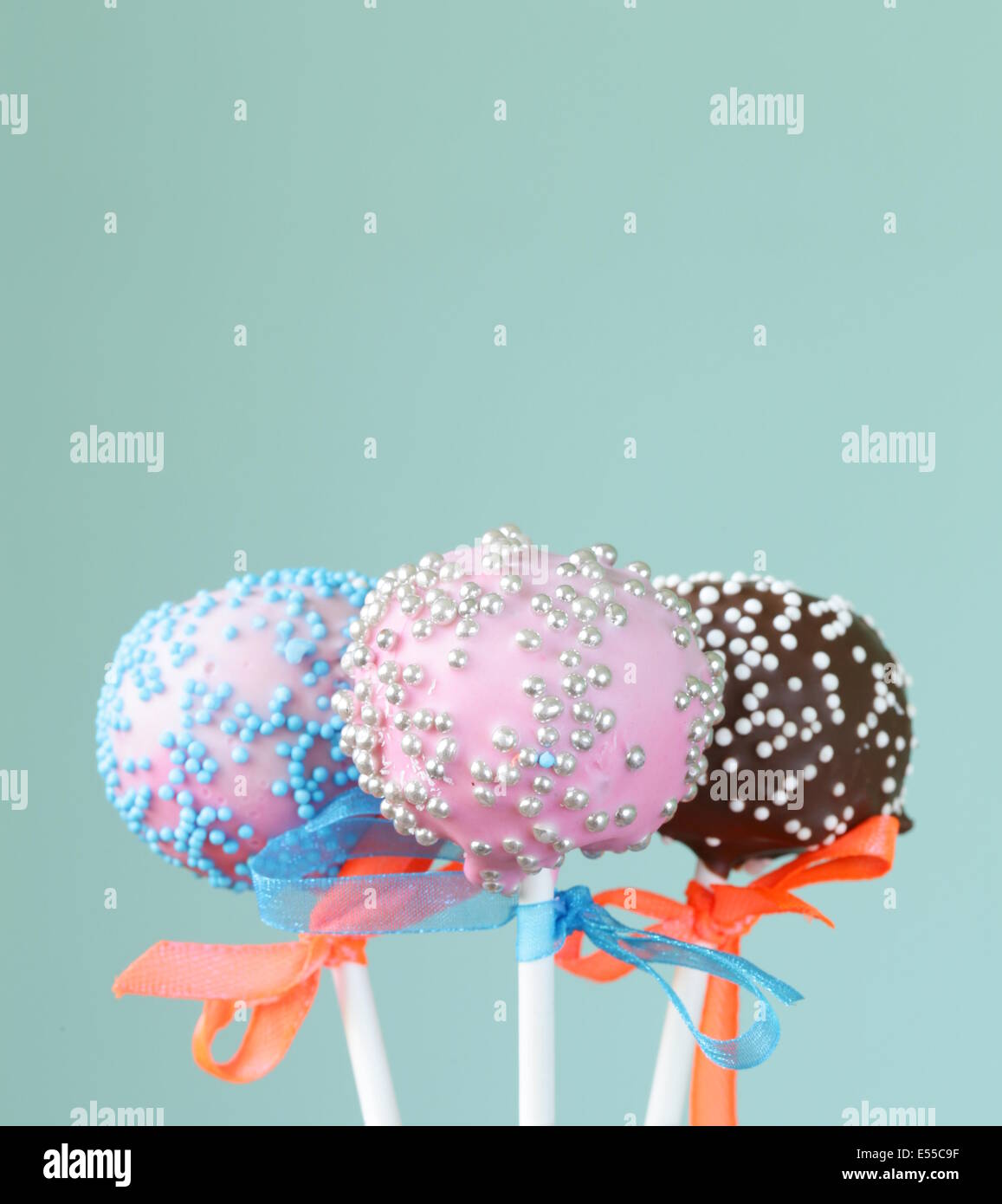 Variety of colorful cake pops - chocolate, vanilla and caramel flavors ...