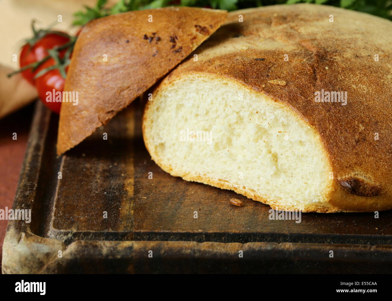 traditional Italian ciabatta bread with tomatoes and herbs Stock Photo ...