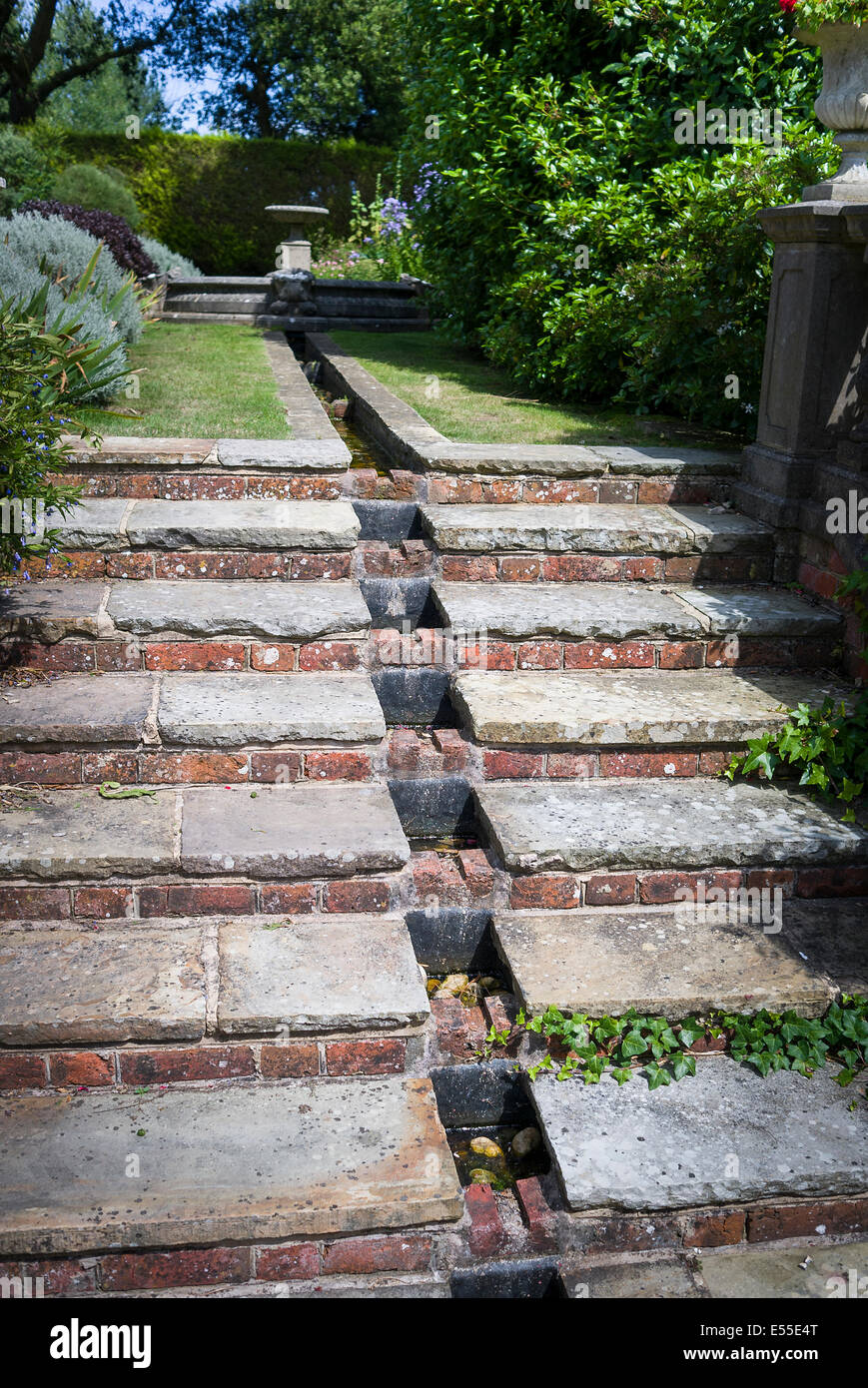 Narrow rill descends steps in a Guernsey garden Stock Photo - Alamy