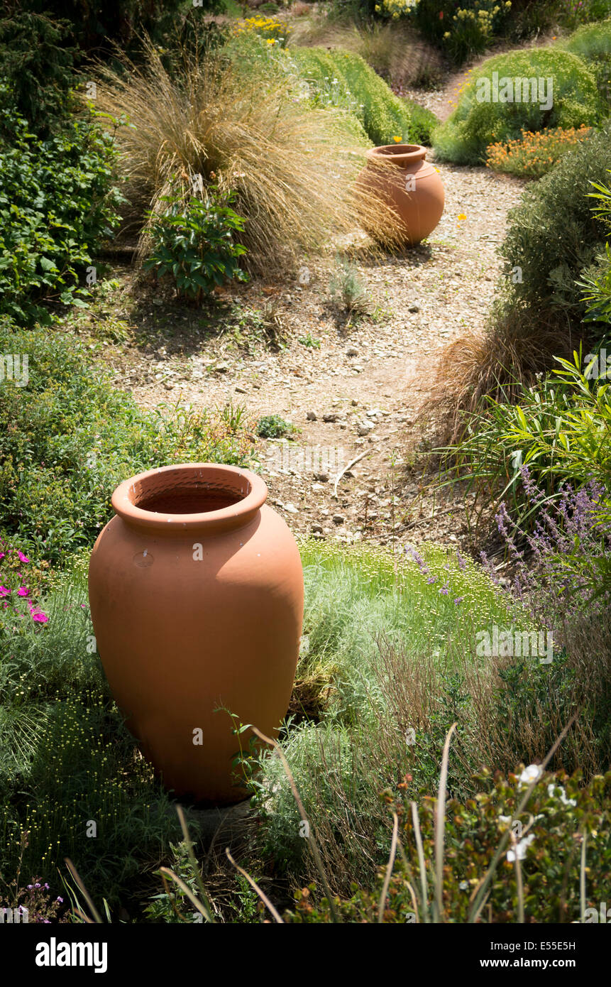 A terracotta pot in the garden at Wildside in Devon Stock Photo - Alamy