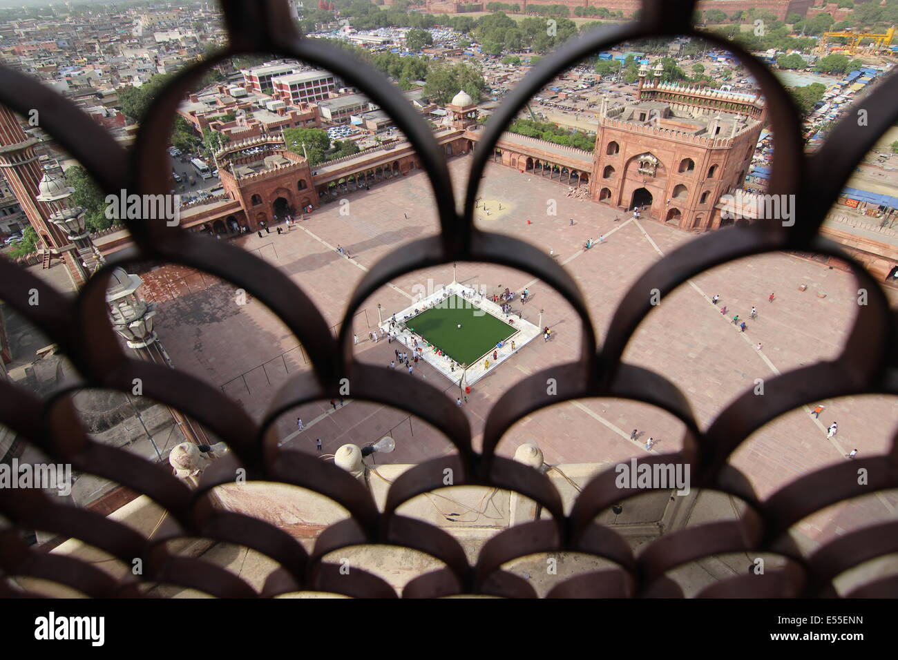 Two entrances of Jama Masjid, and the ablution pool, captured from one ...