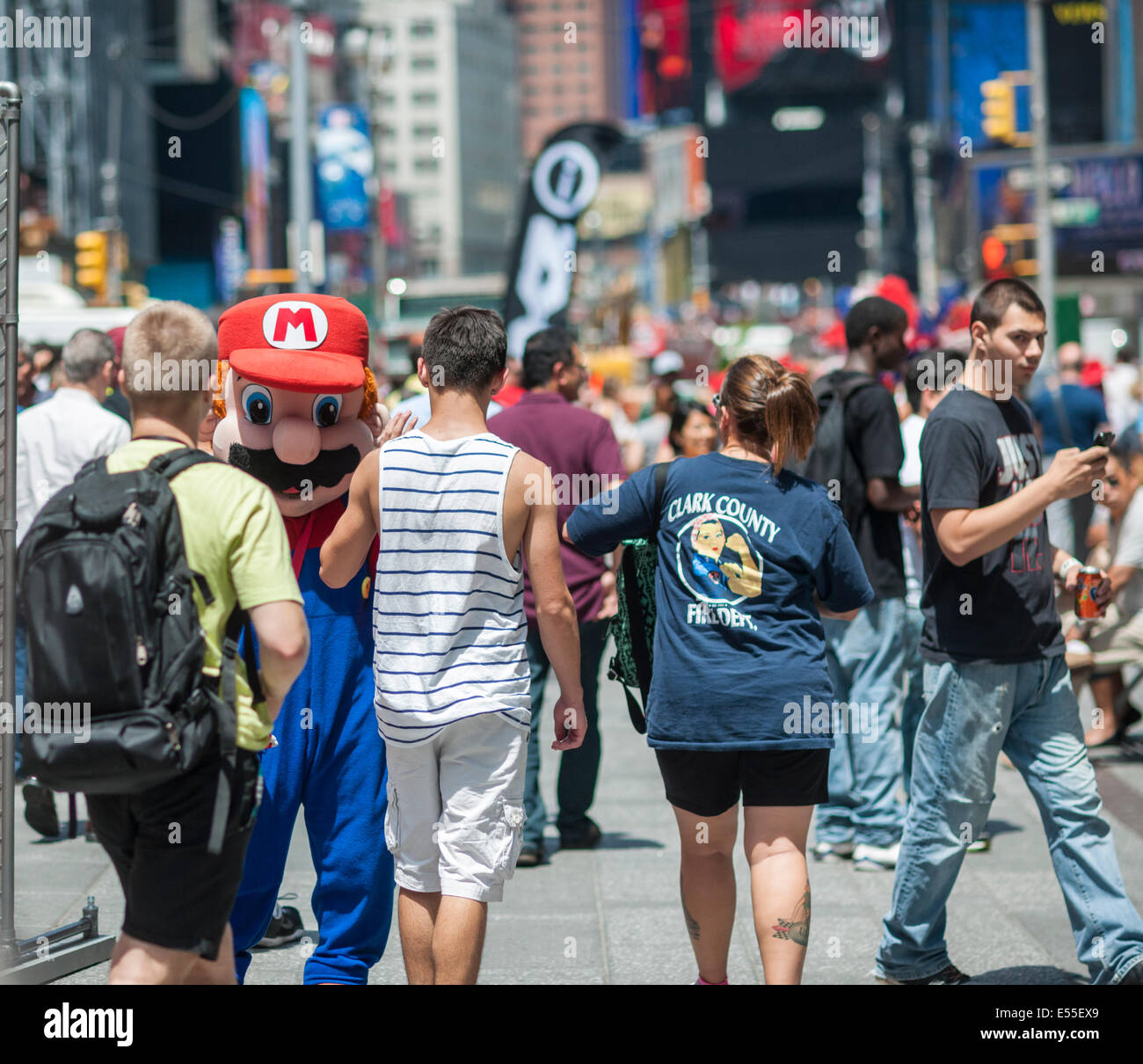 Super Mario solicits tourists in Times Square in New York on Friday ...