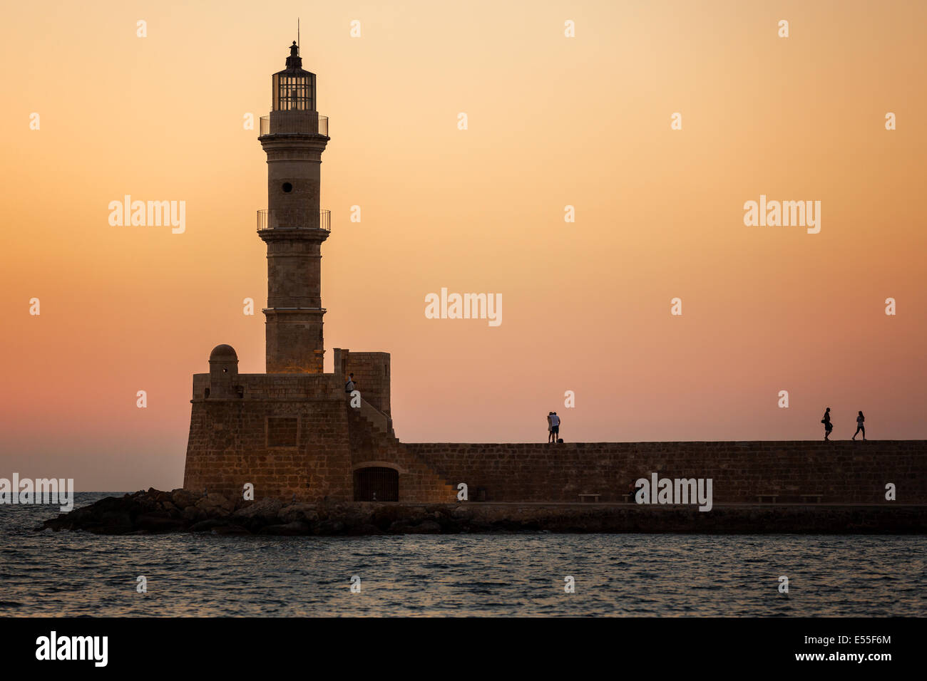 Chania lighthouse and harbor at sunset, Crete, Greece Stock Photo - Alamy