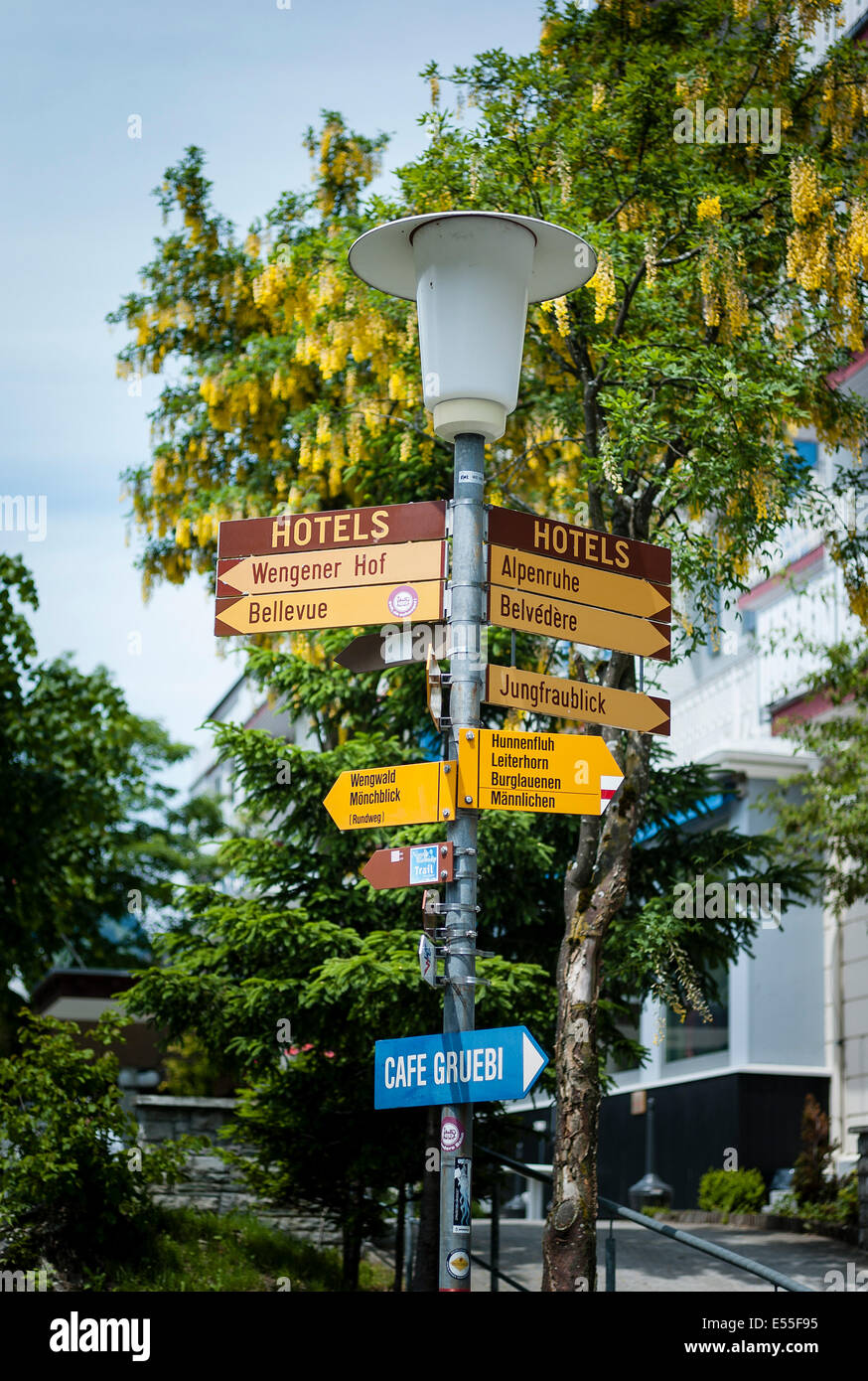Signs in Wengen showing directions to tourist hotels Stock Photo - Alamy