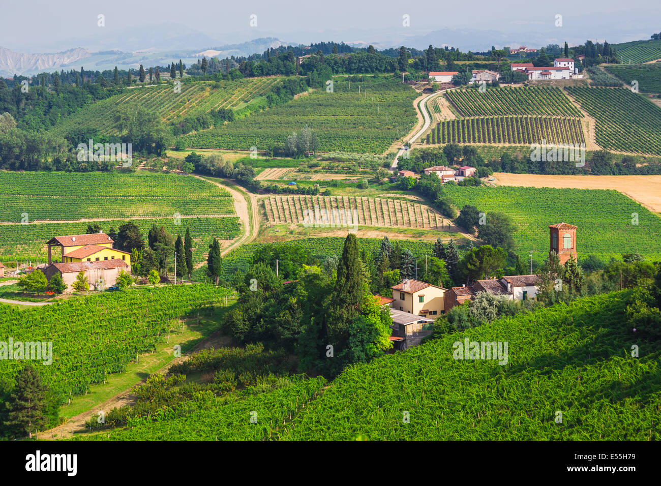 rural landscape with houses standing alone in the province of Tuscany ...