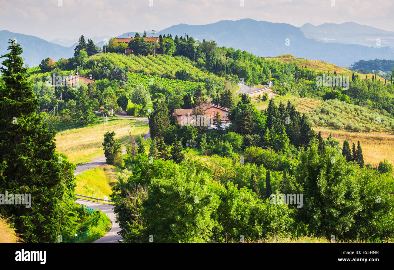 rural landscape with houses standing alone in the province of Tuscany ...