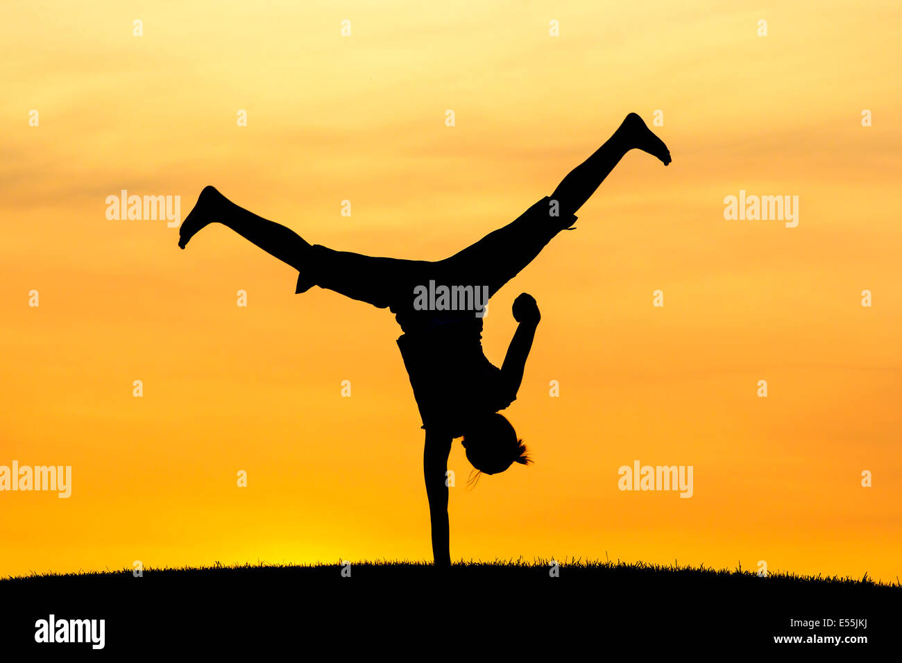 One handed cartwheel Stock Photo - Alamy