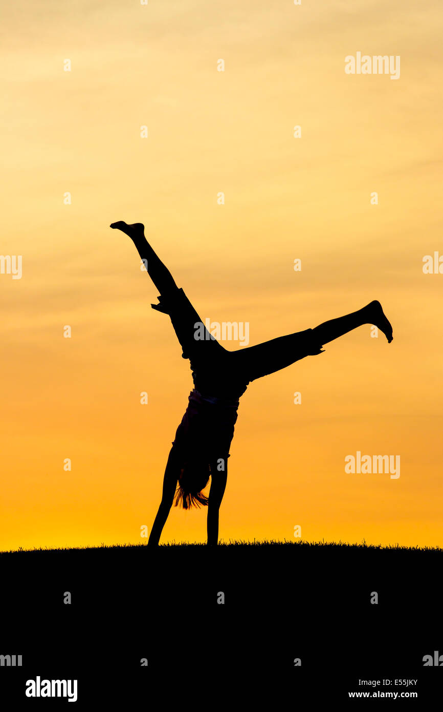 Cartwheel silhouette hi-res stock photography and images - Alamy