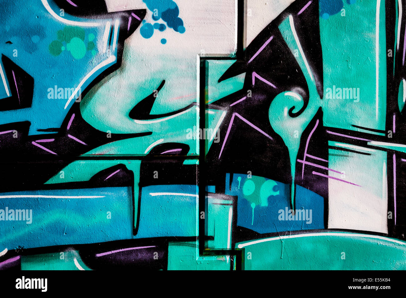 Blue signs, colorful graffiti, abstract grunge grafiti background over ...