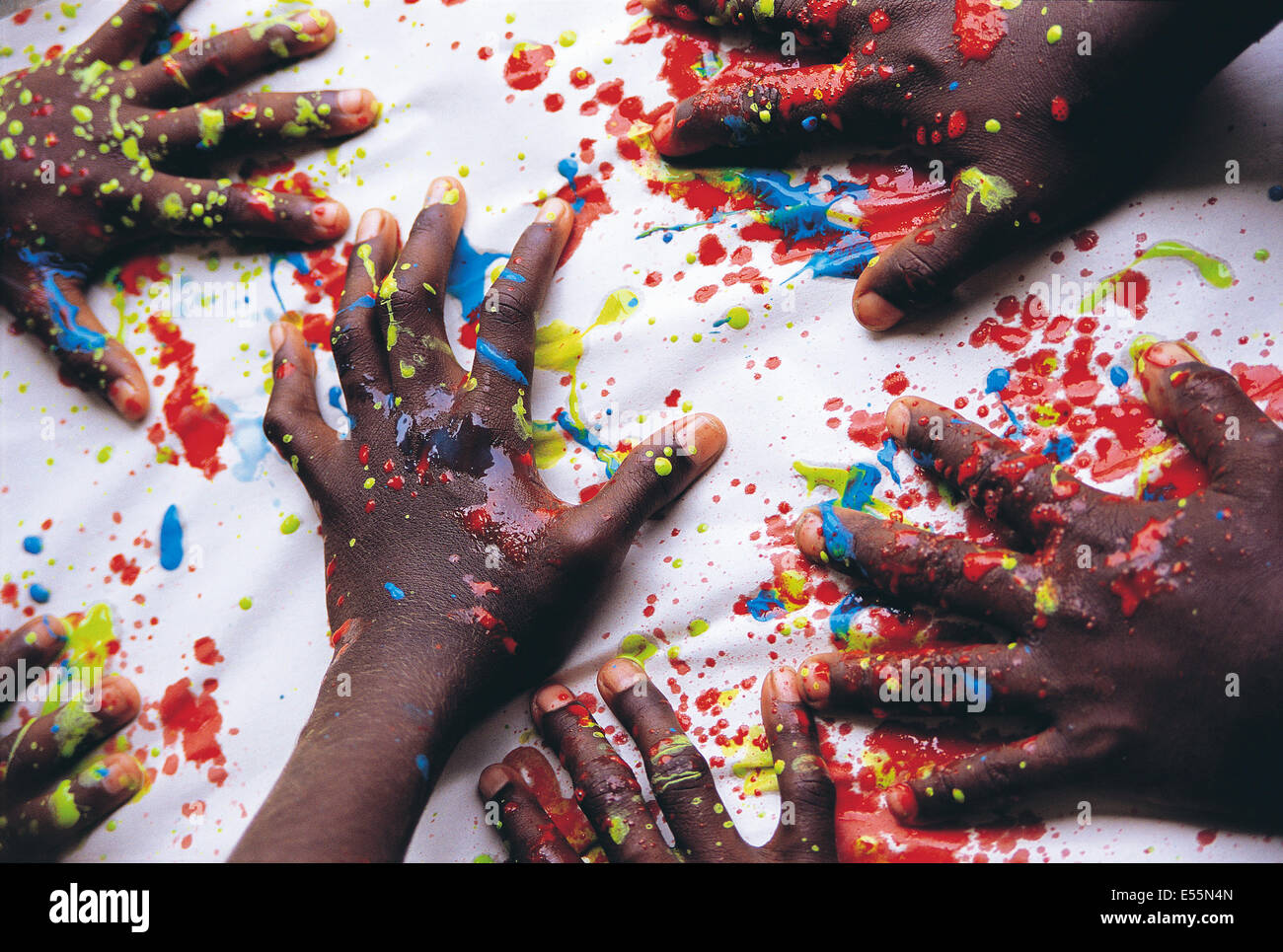 The hands of aboriginal children painting Stock Photo - Alamy