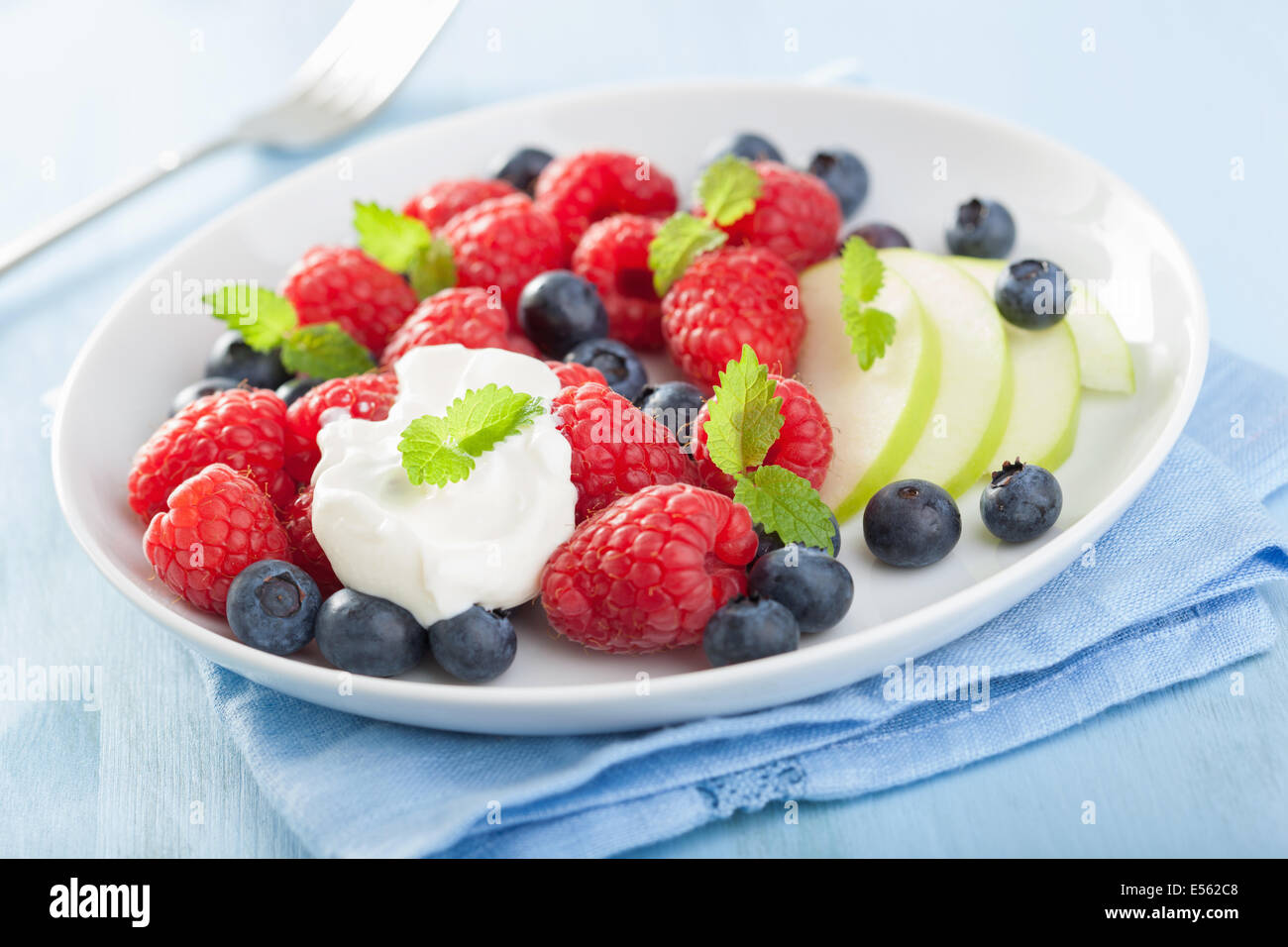 fresh fruit salad with raspberry blueberry apple Stock Photo - Alamy