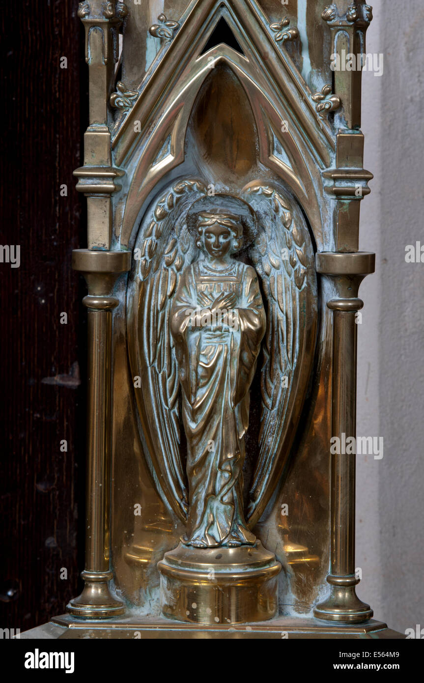 Brass angel in St. Margaret`s Church, Crick, Northamptonshire, England ...