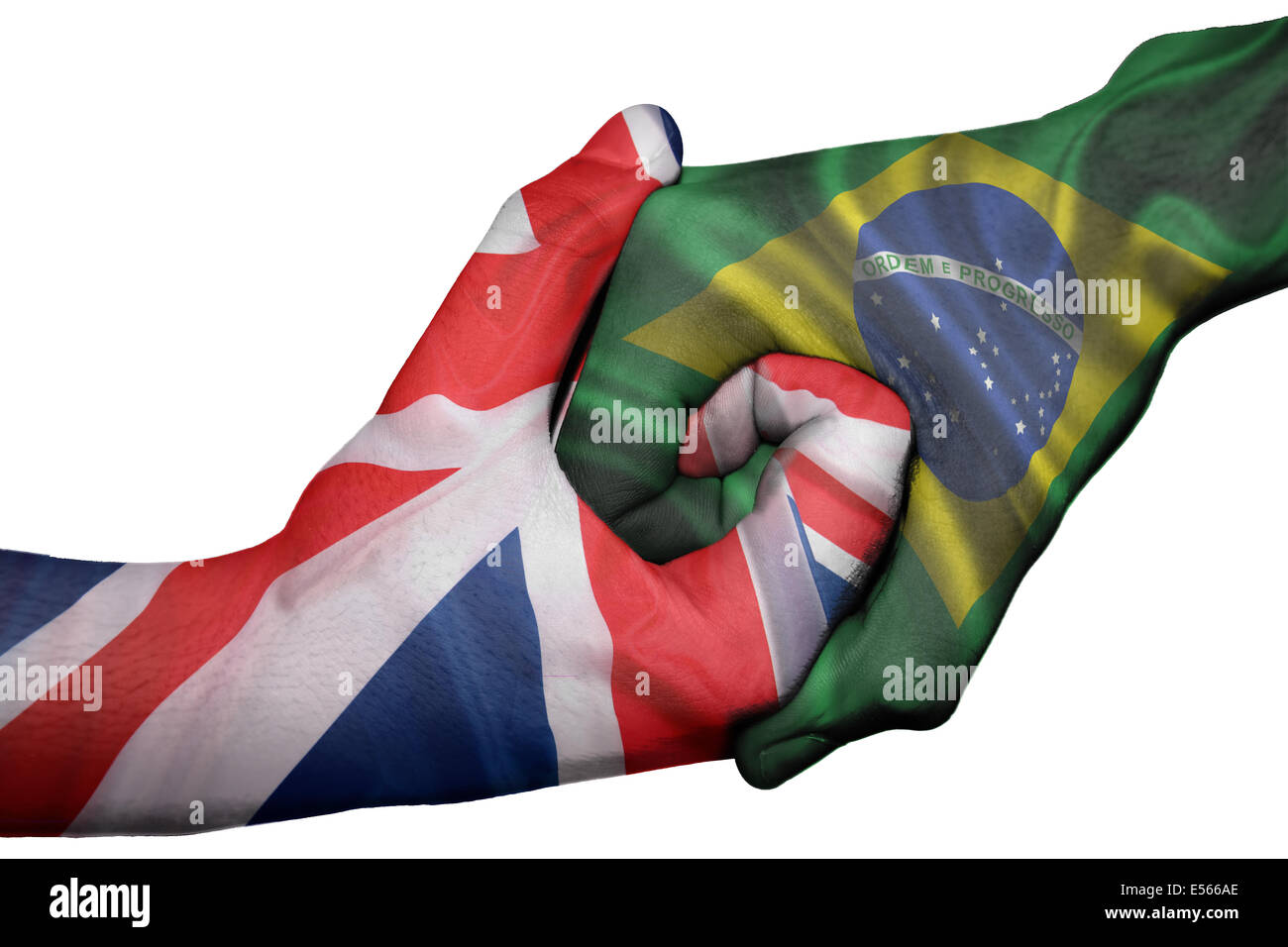 Diplomatic handshake between countries: flags of United Kingdom and ...