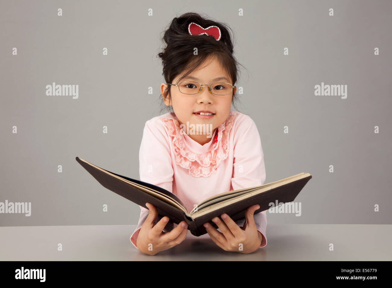 Child holding camera front facing hi-res stock photography and images ...